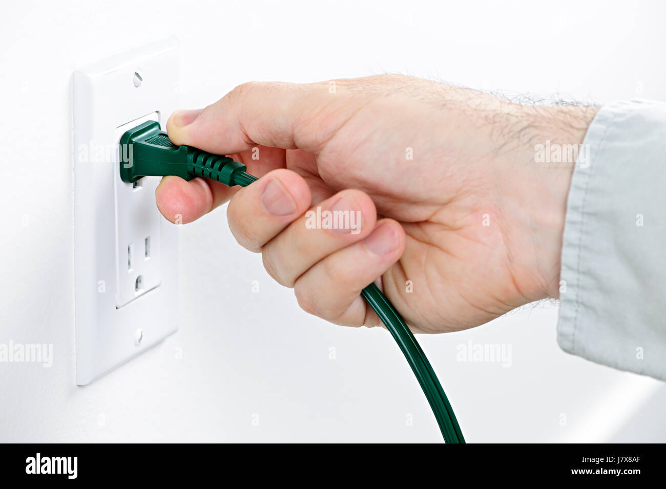 hand energy power electricity electric power wall outlet socket wire ...