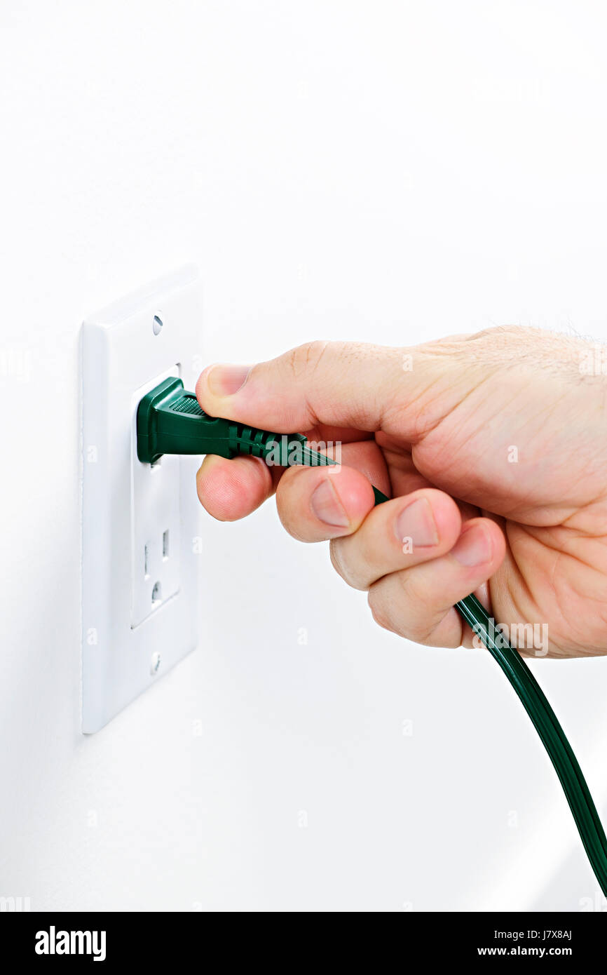 hand energy power electricity electric power wall outlet socket wire ...