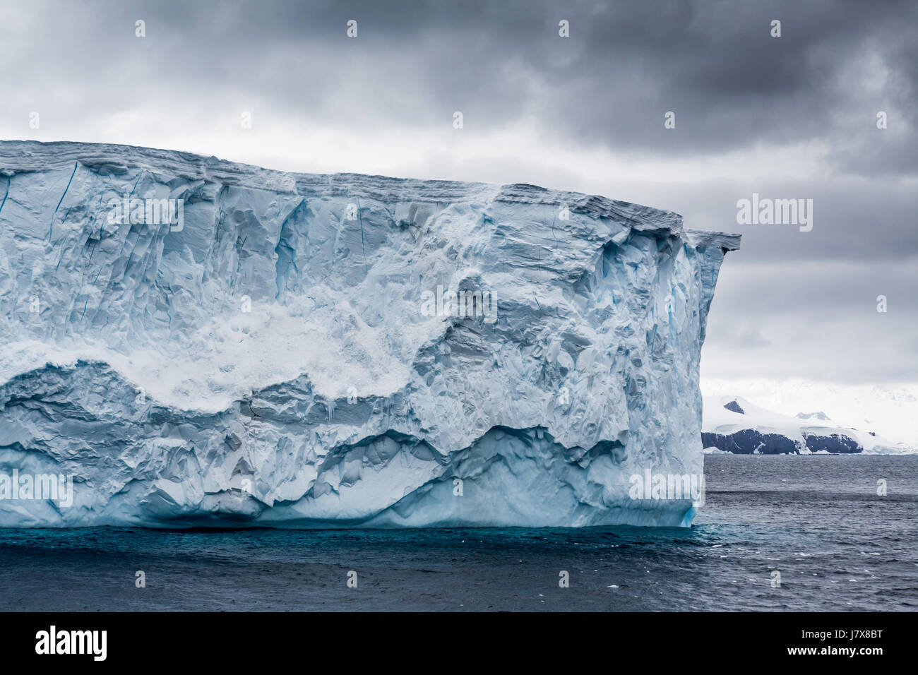 Flat, tabletop iceberg from glscier in Antarctica Stock Photo - Alamy