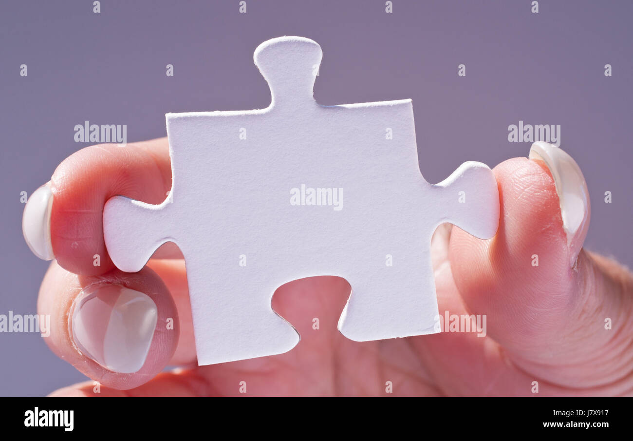 puzzle piece - teamwork and coaching concept Stock Photo - Alamy