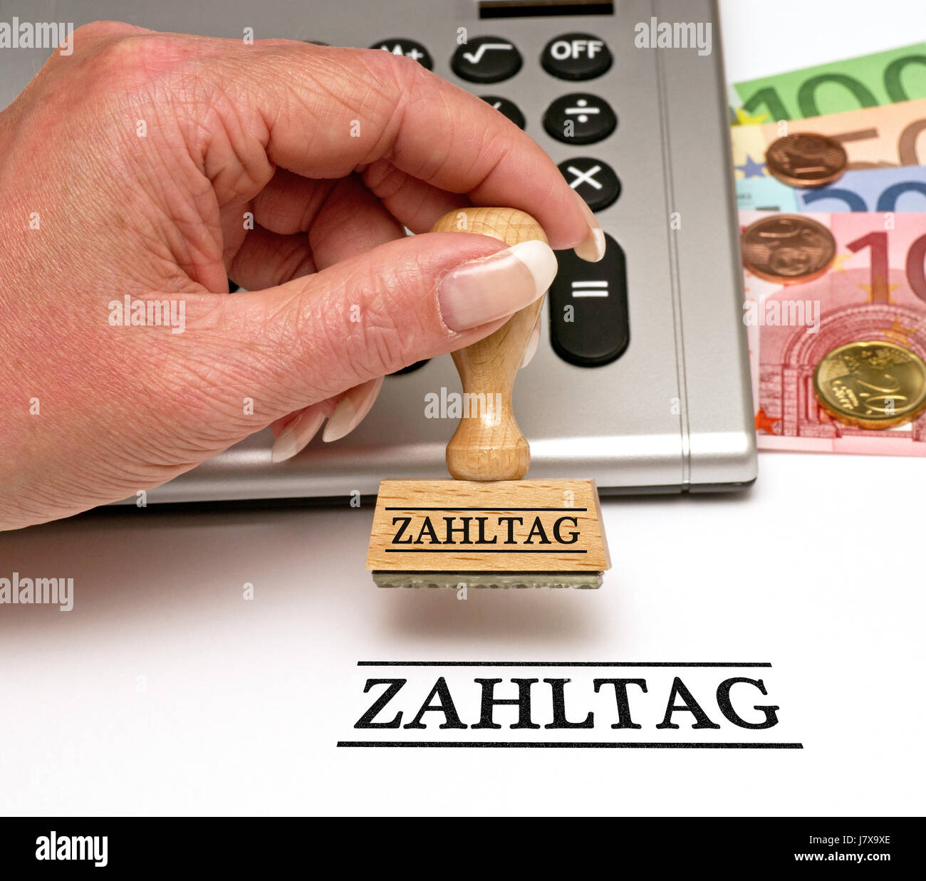 payday - stamp with hand and money Stock Photo - Alamy