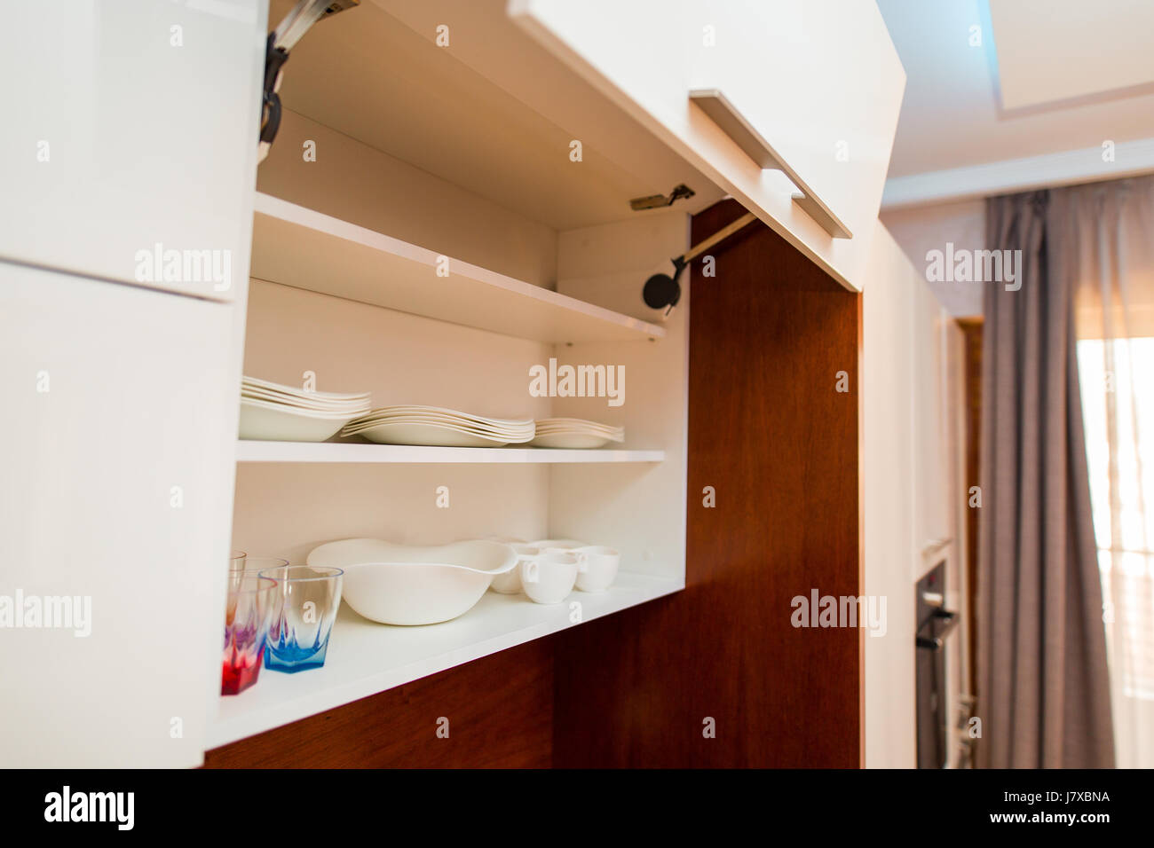 The plates in the kitchen. Cupboards in the kitchen. Kitchen roo Stock ...