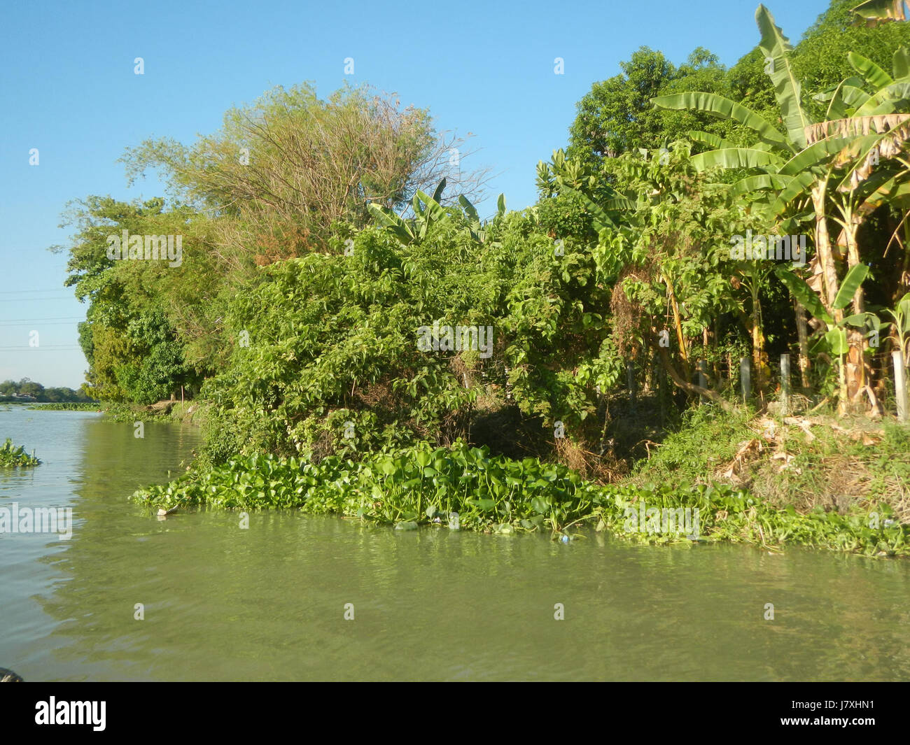 This photograph captures the daily life in Barangay Meyto, Santa Lucia ...