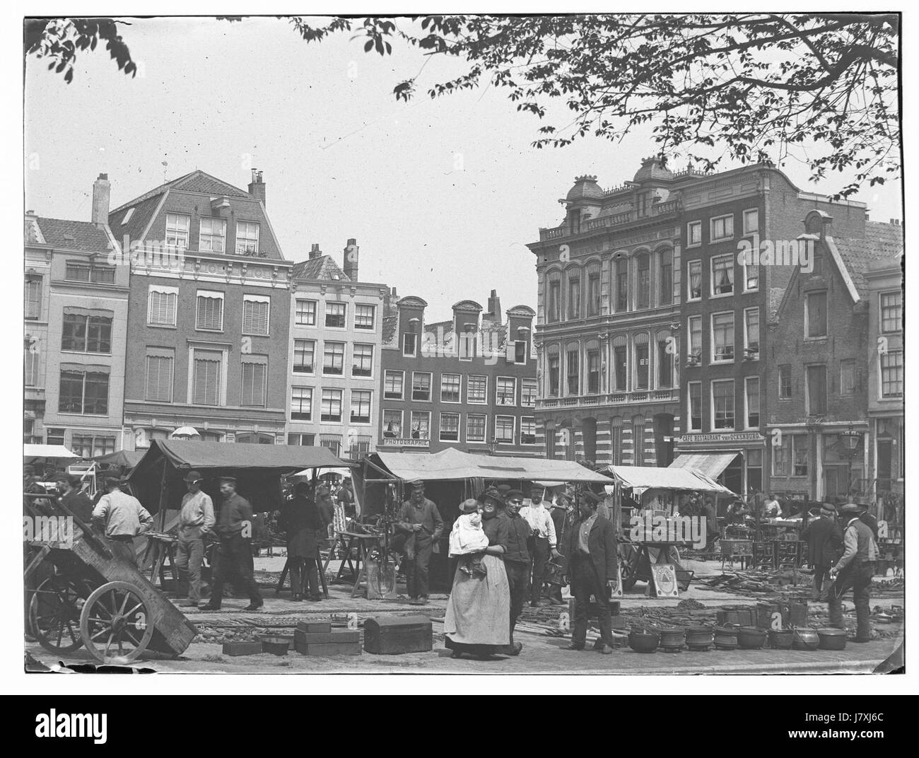 A photograph by Jacob Olie showcasing Amstelveld in Amsterdam, with a ...