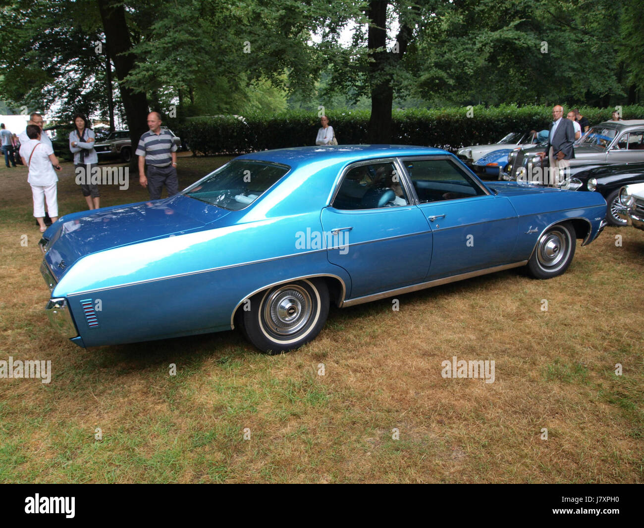 This image shows a 1970 Chevrolet Impala, an iconic American car from ...
