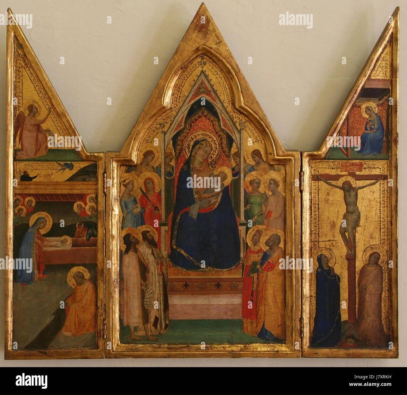 The Triptych of the Virgin Nursing the Child, painted by Bernardo Daddi, is a religious artwork ...