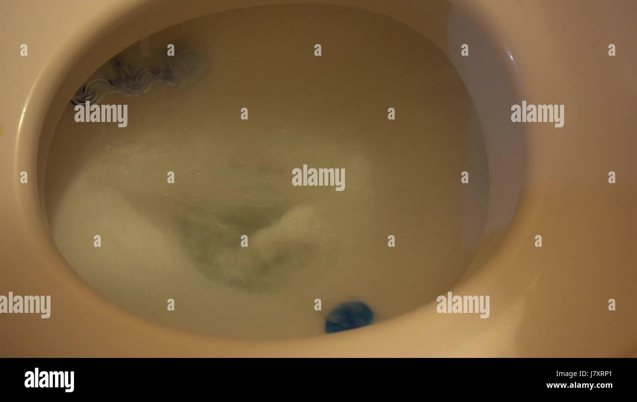 water flush white toilet,shooting at close range Stock Photo - Alamy