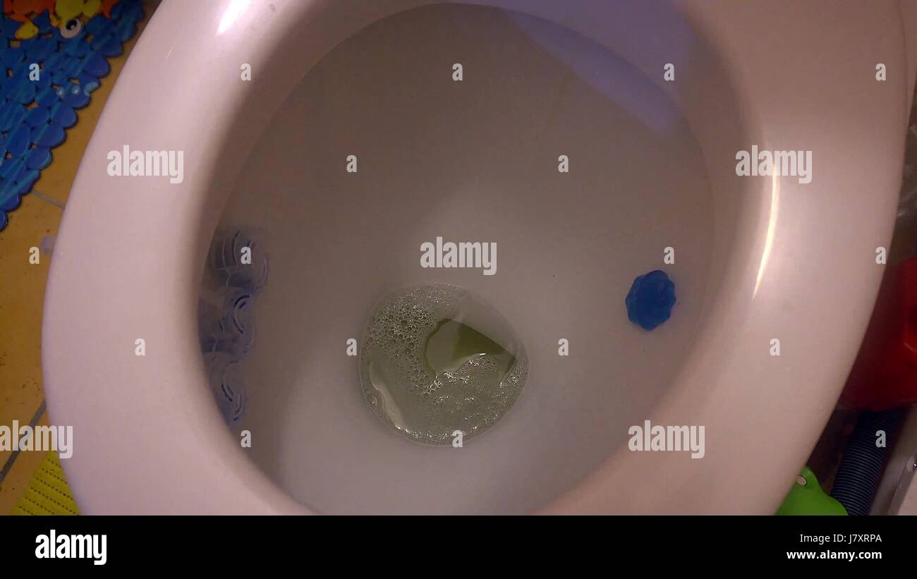 water flush white toilet,shooting at close range Stock Photo - Alamy