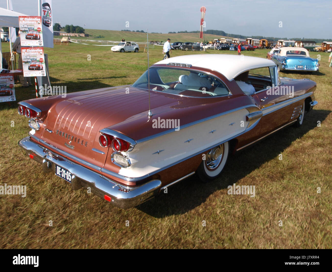 This photograph captures a 1958 Pontiac Bonneville, a classic American ...