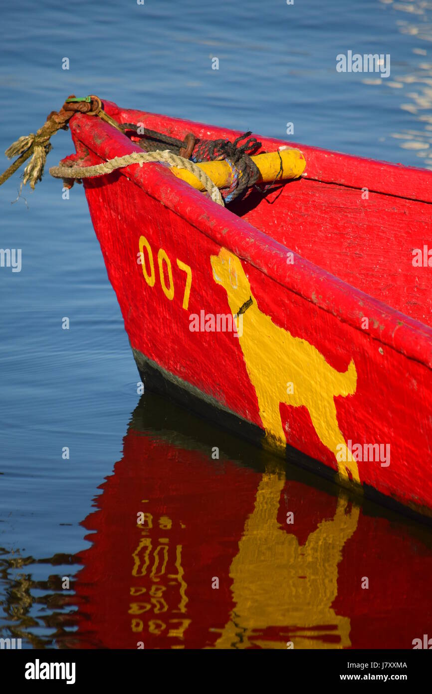 Red dinghy boat in the harbor in Nantucket, MA Stock Photo - Alamy