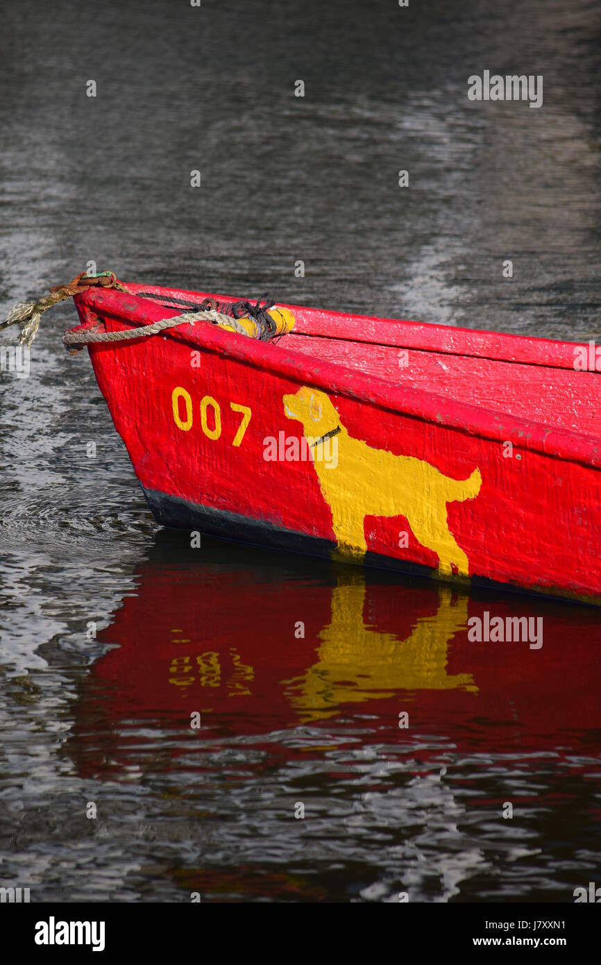 Red dinghy boat in the harbor in Nantucket, MA Stock Photo - Alamy