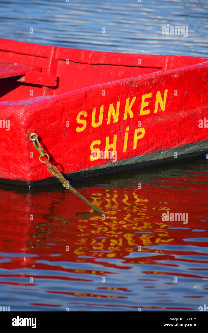 Red dinghy boat in the harbor in Nantucket, MA Stock Photo - Alamy