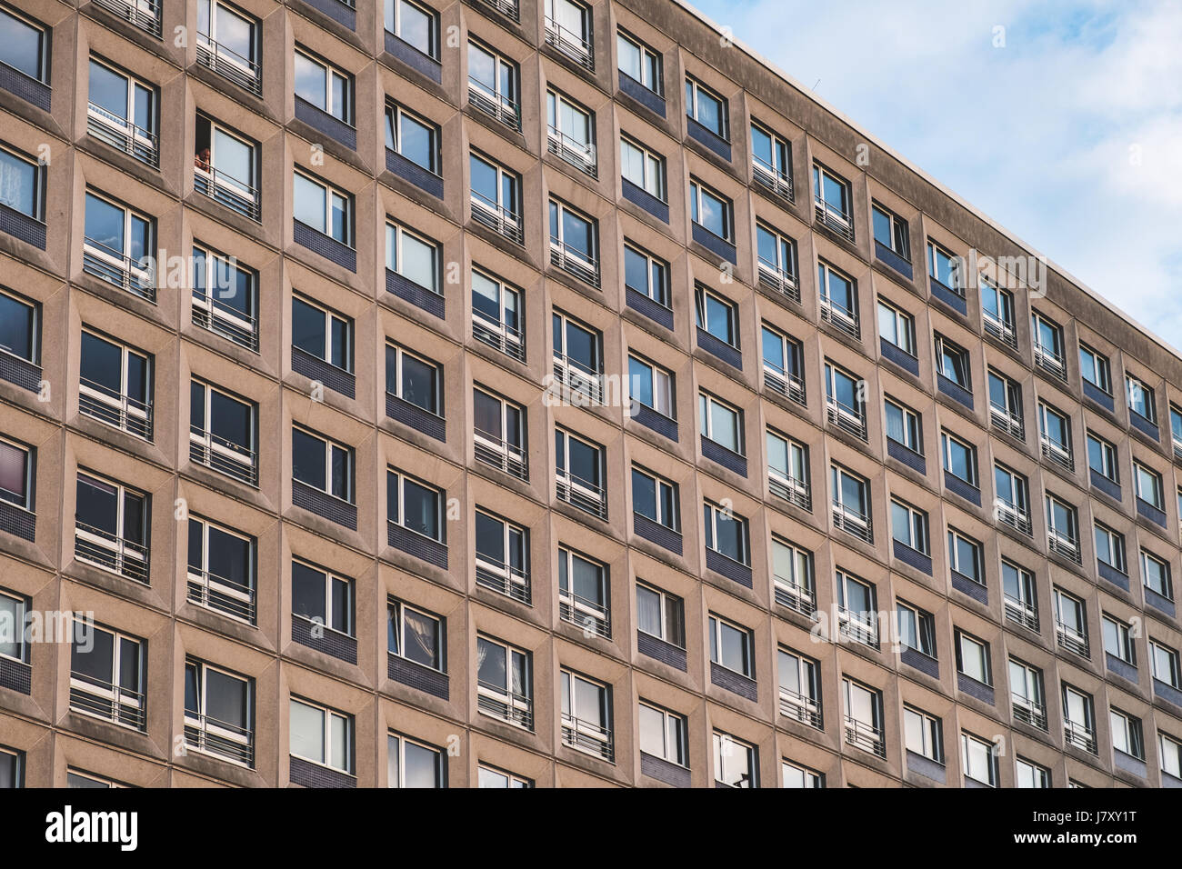 large tenement building facade - apartment block Stock Photo - Alamy
