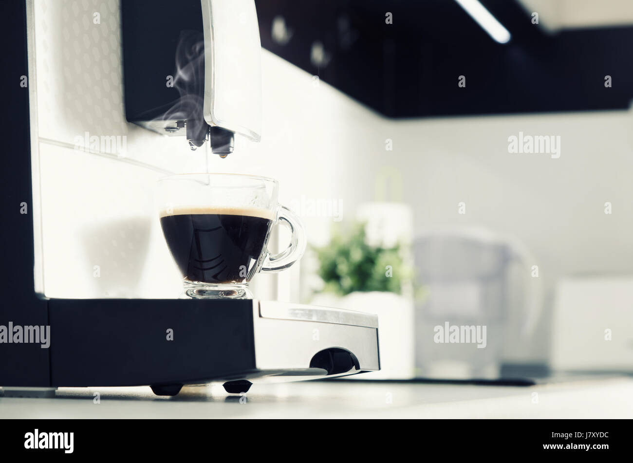 Professional home coffee maker in modern kitchen. coffee machine ...