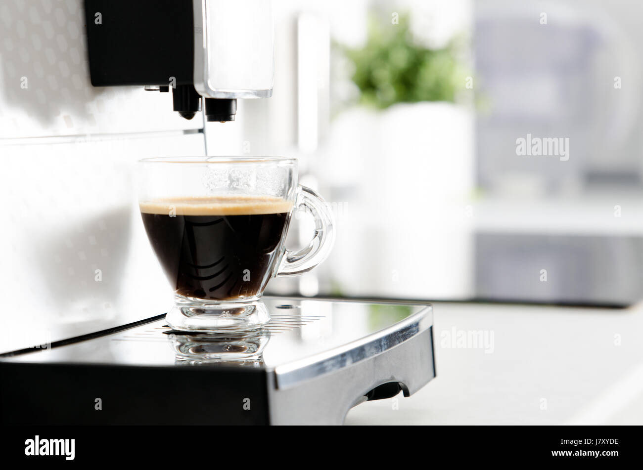 Professional home coffee maker in modern kitchen. coffee machine ...