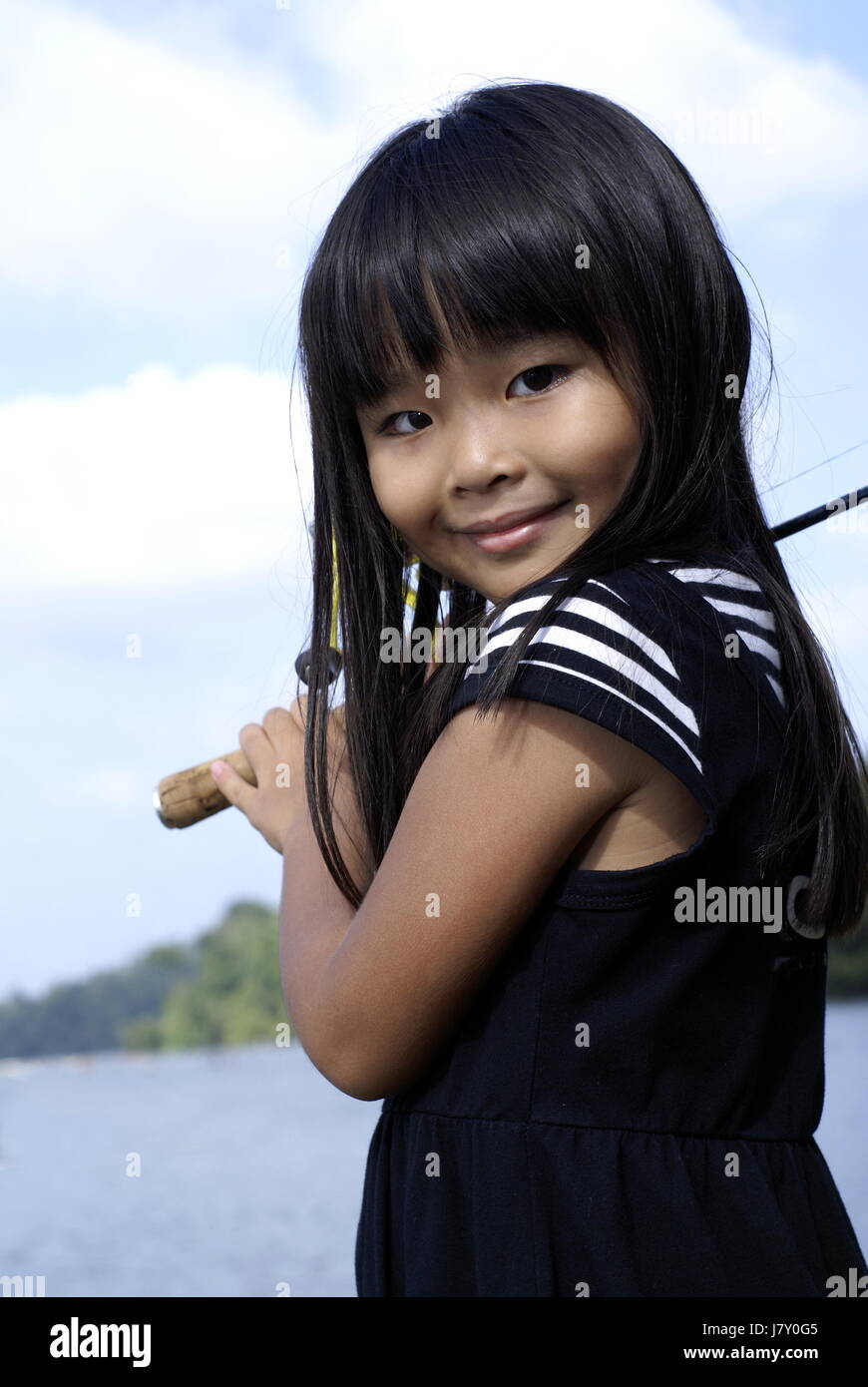 hobby fishing japanese asian childhood child angler girl girls portrait ...