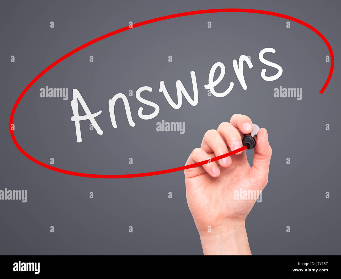 Man Hand writing Answers with marker on transparent wipe board ...