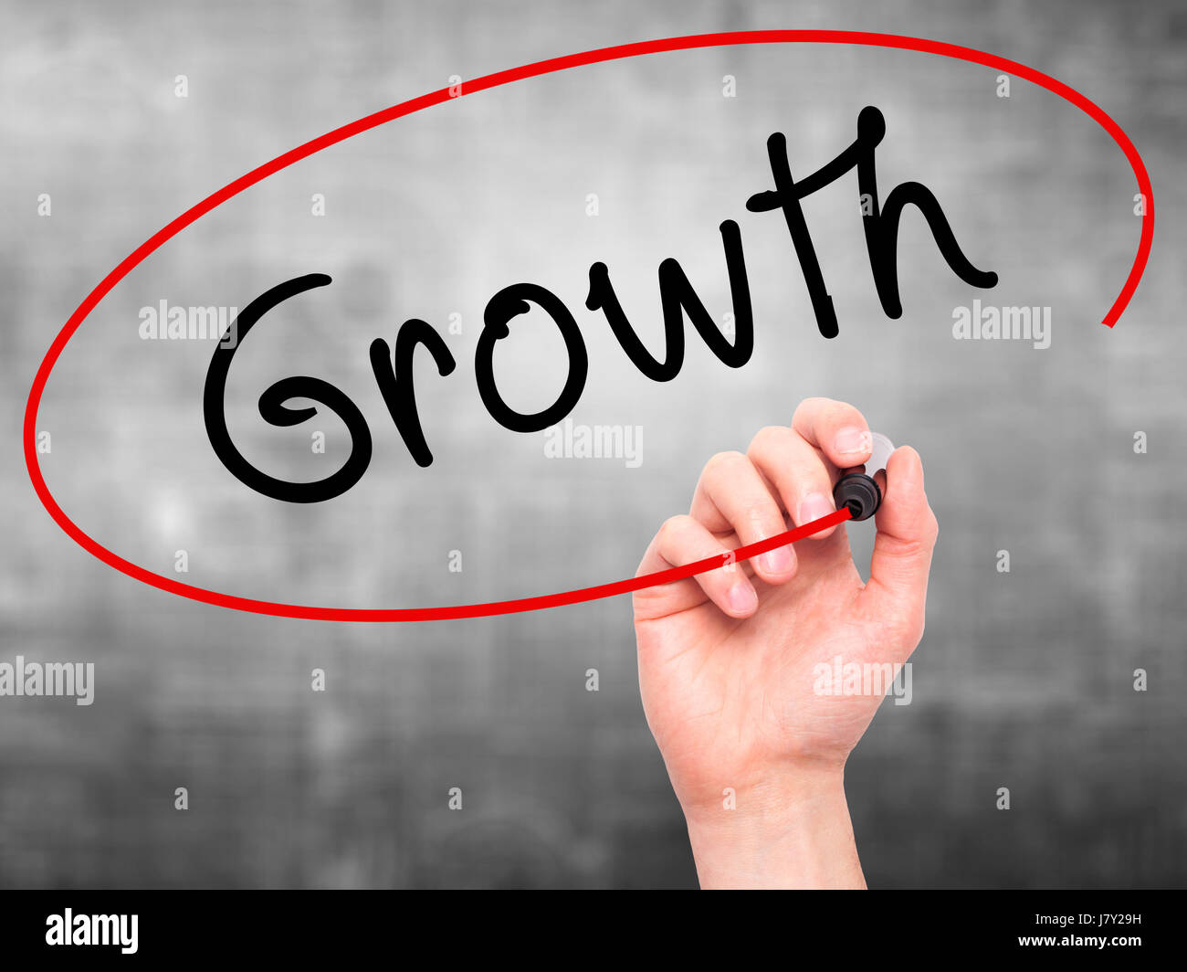 Man Hand writing Growth with marker on transparent wipe board. Isolated ...