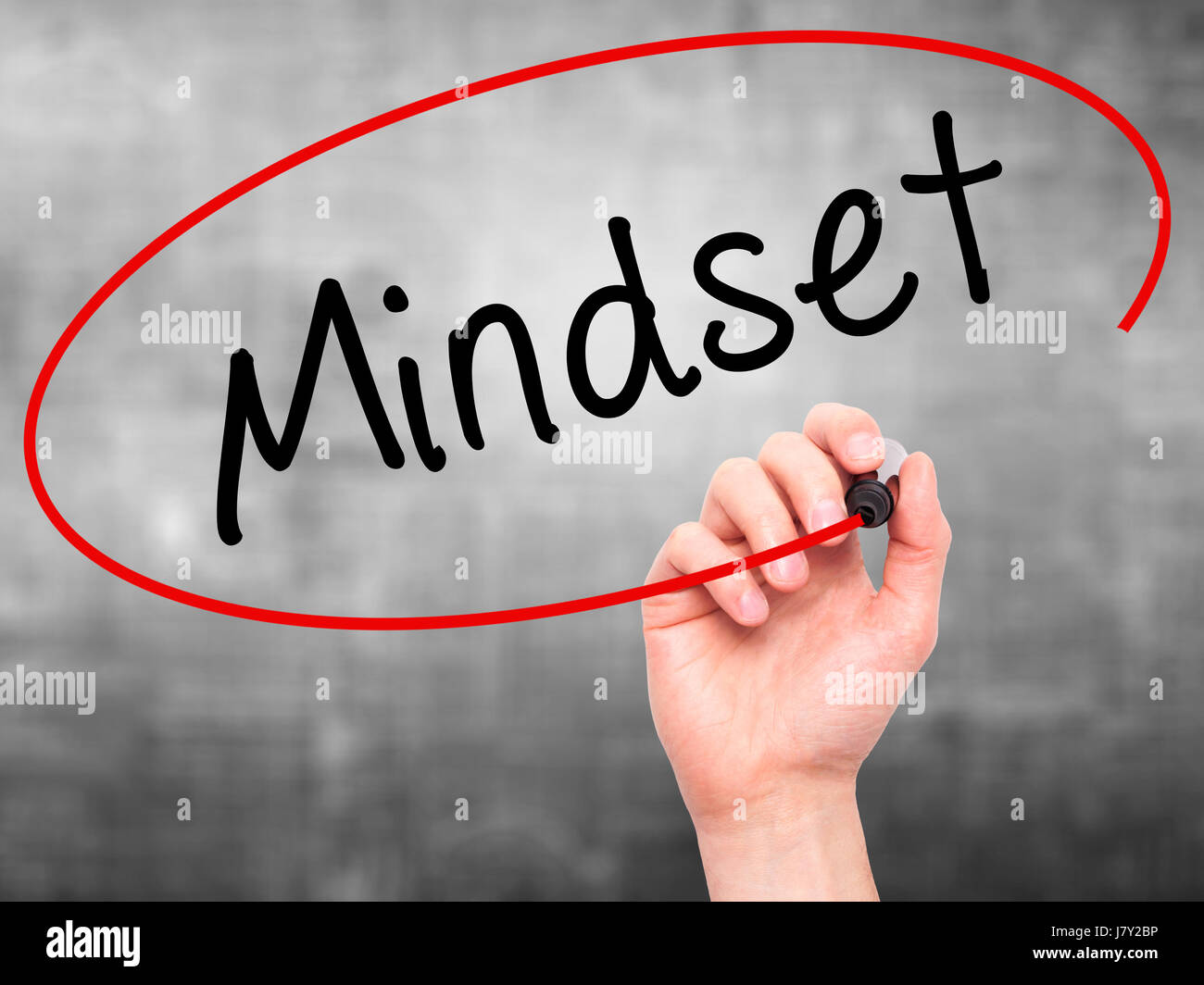 Man Hand writing Mindset with marker on transparent wipe board isolated ...