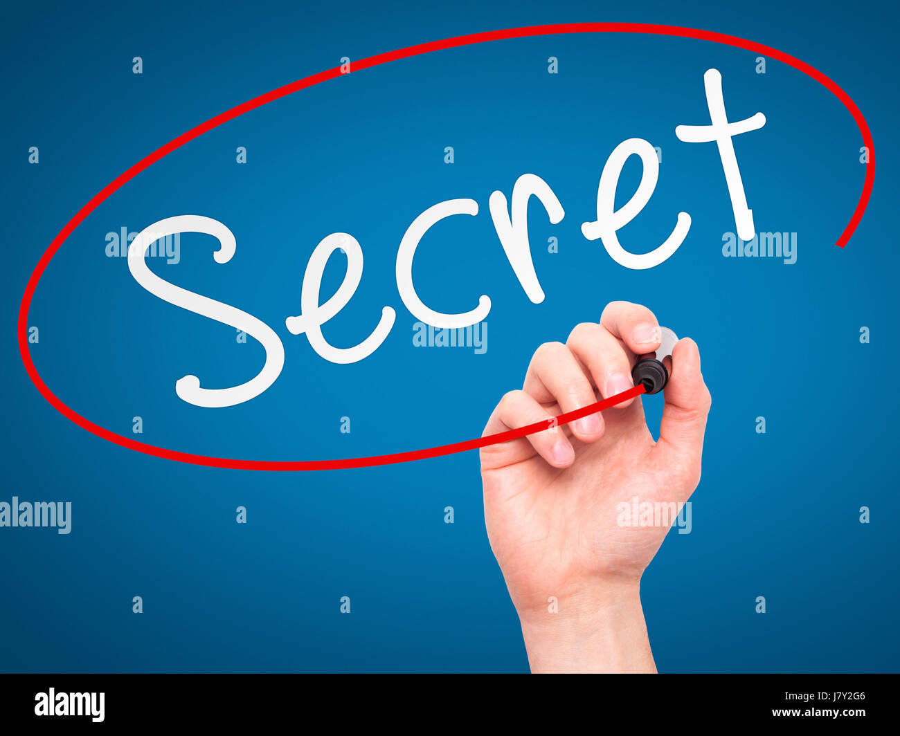 Man Hand writing Secret black marker on visual screen. Isolated on blue ...