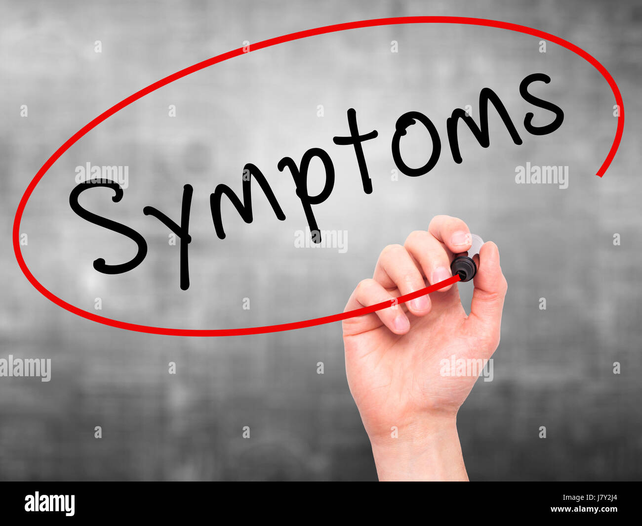 Man Hand writing Symptoms black marker on visual screen. Isolated on ...