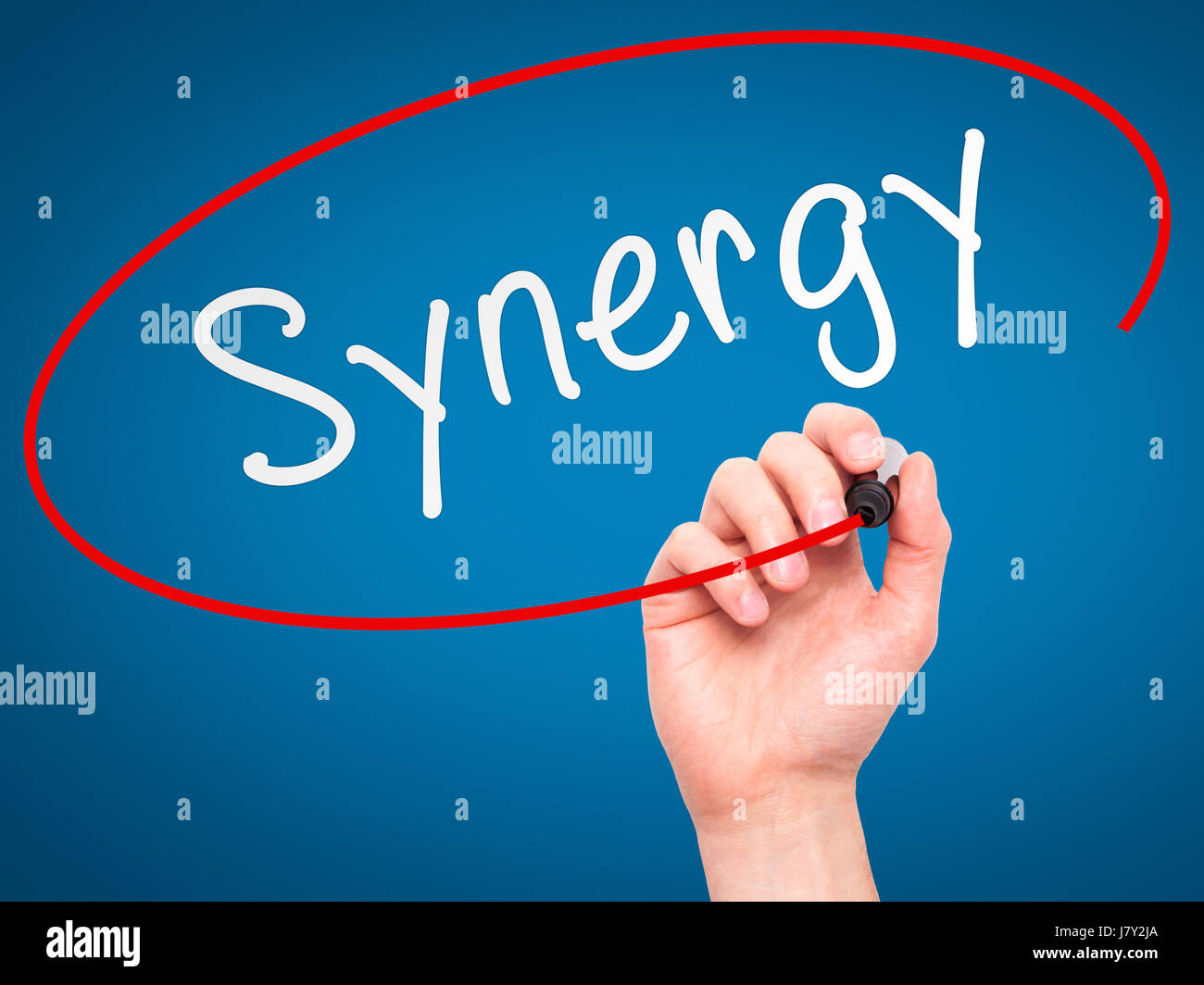 Man Hand writing Synergy black marker on visual screen. Isolated on ...