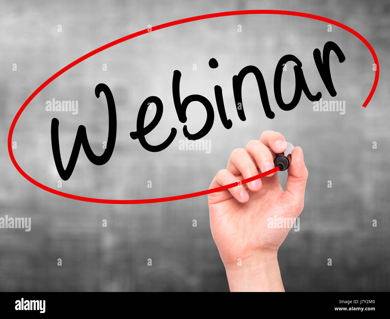 Man Hand writing Webinar black marker on visual screen. Isolated on ...