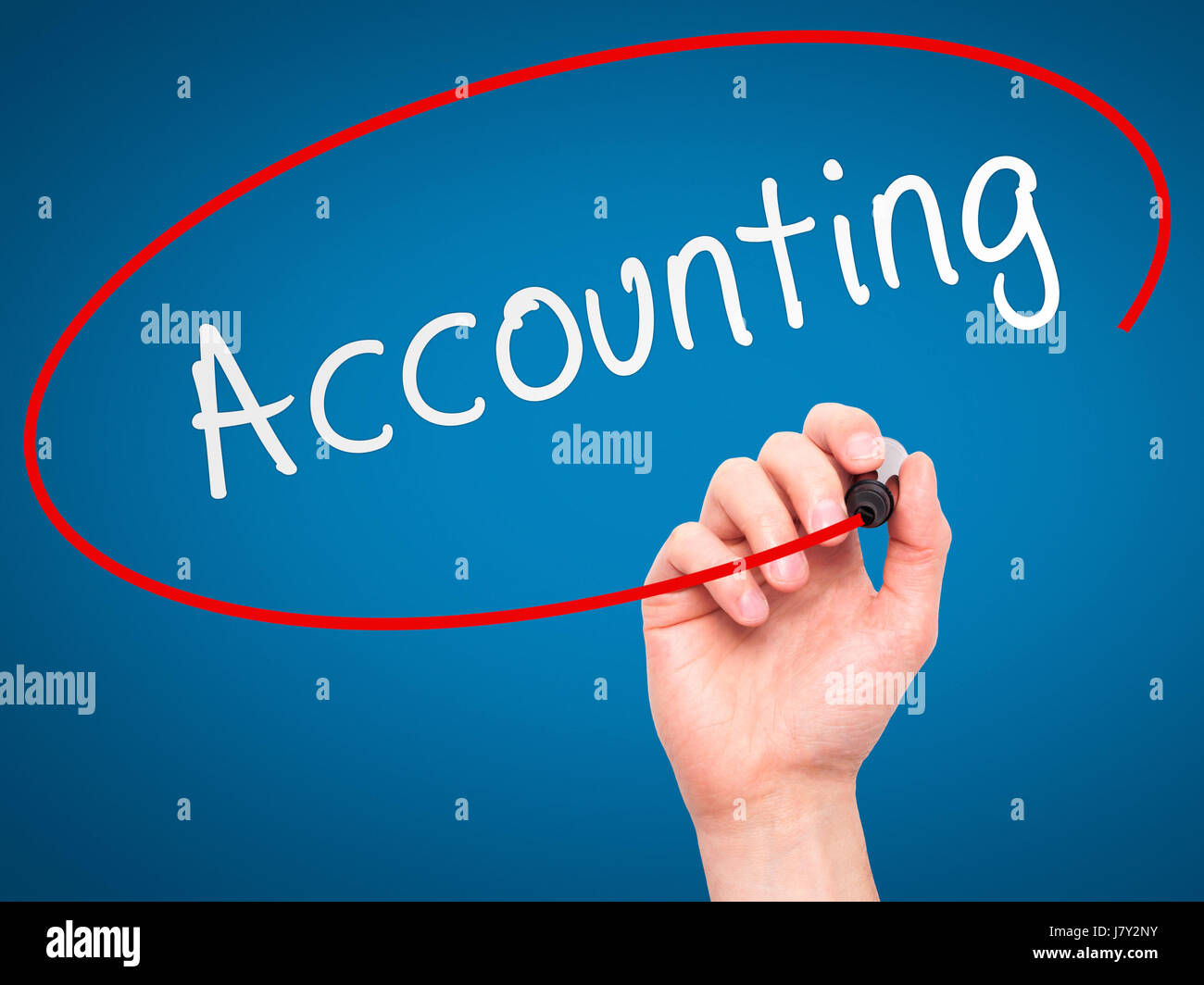 Man Hand writing Accounting with marker on transparent wipe board ...