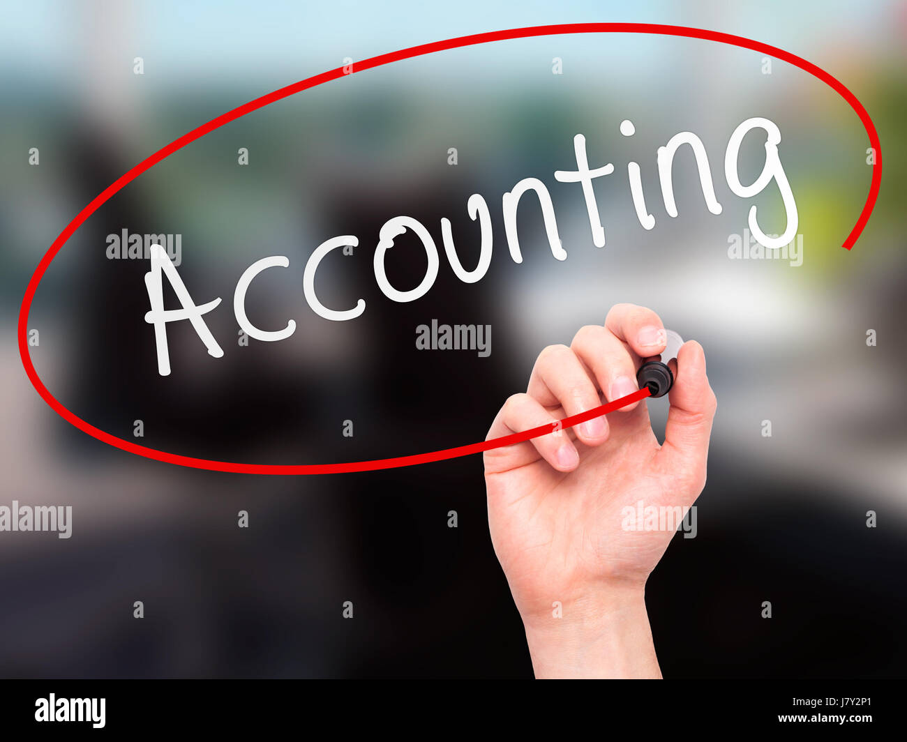 Man Hand writing Accounting with marker on transparent wipe board ...