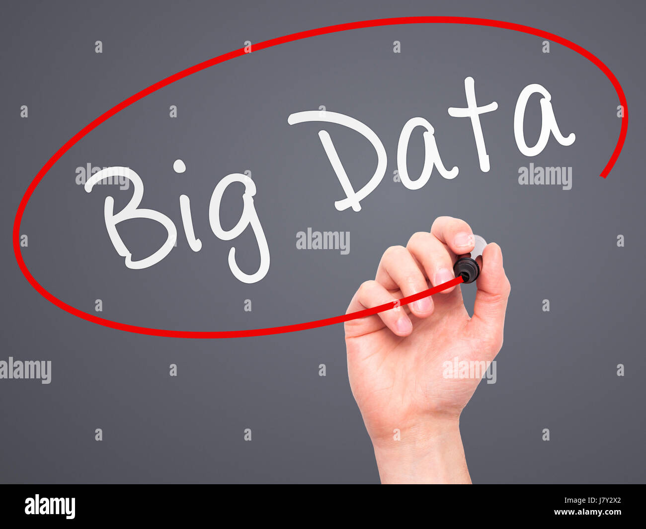 Man Hand writing Big Data with marker on transparent wipe board ...