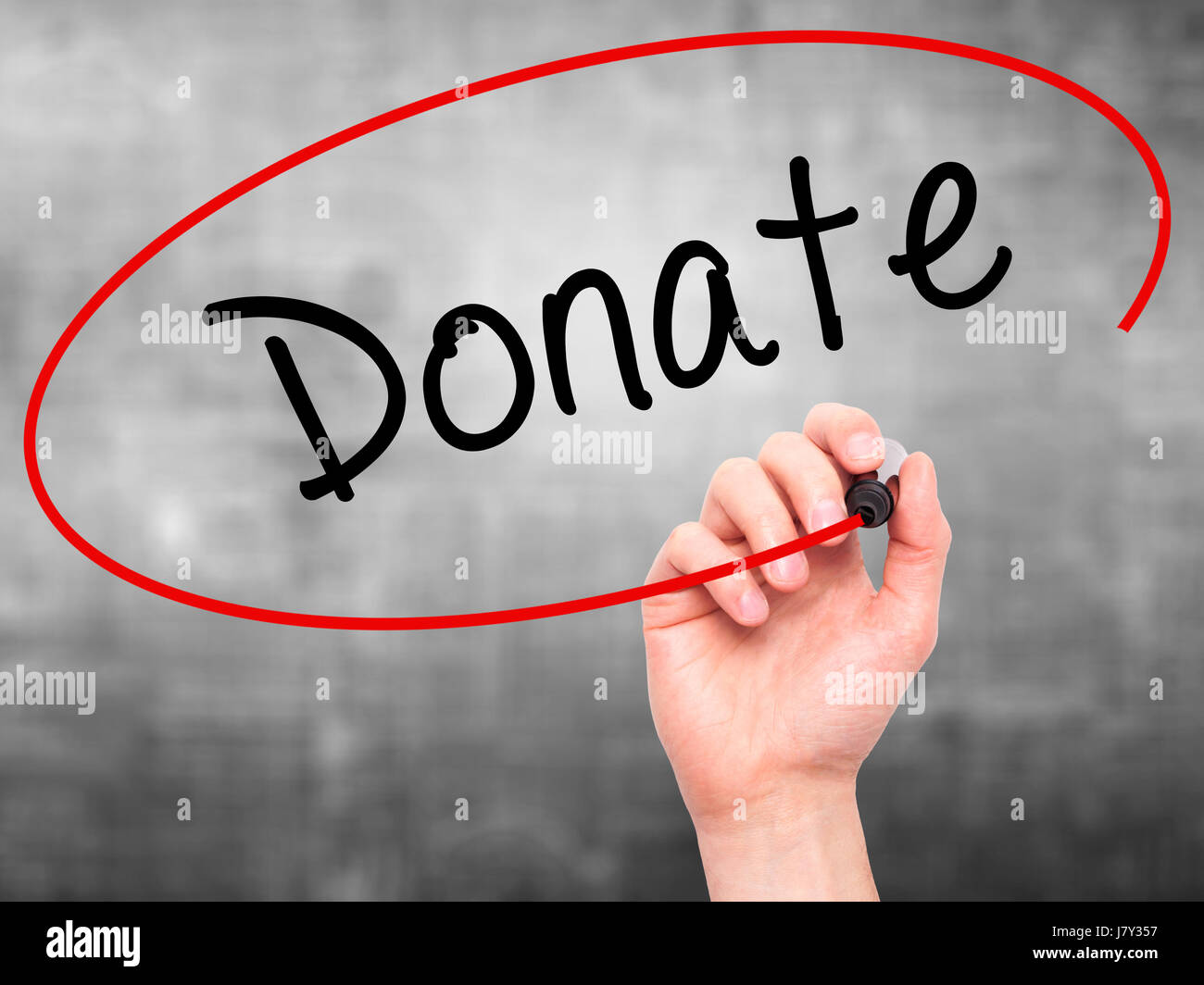 Man Hand writing Donate with marker on transparent wipe board. Isolated ...