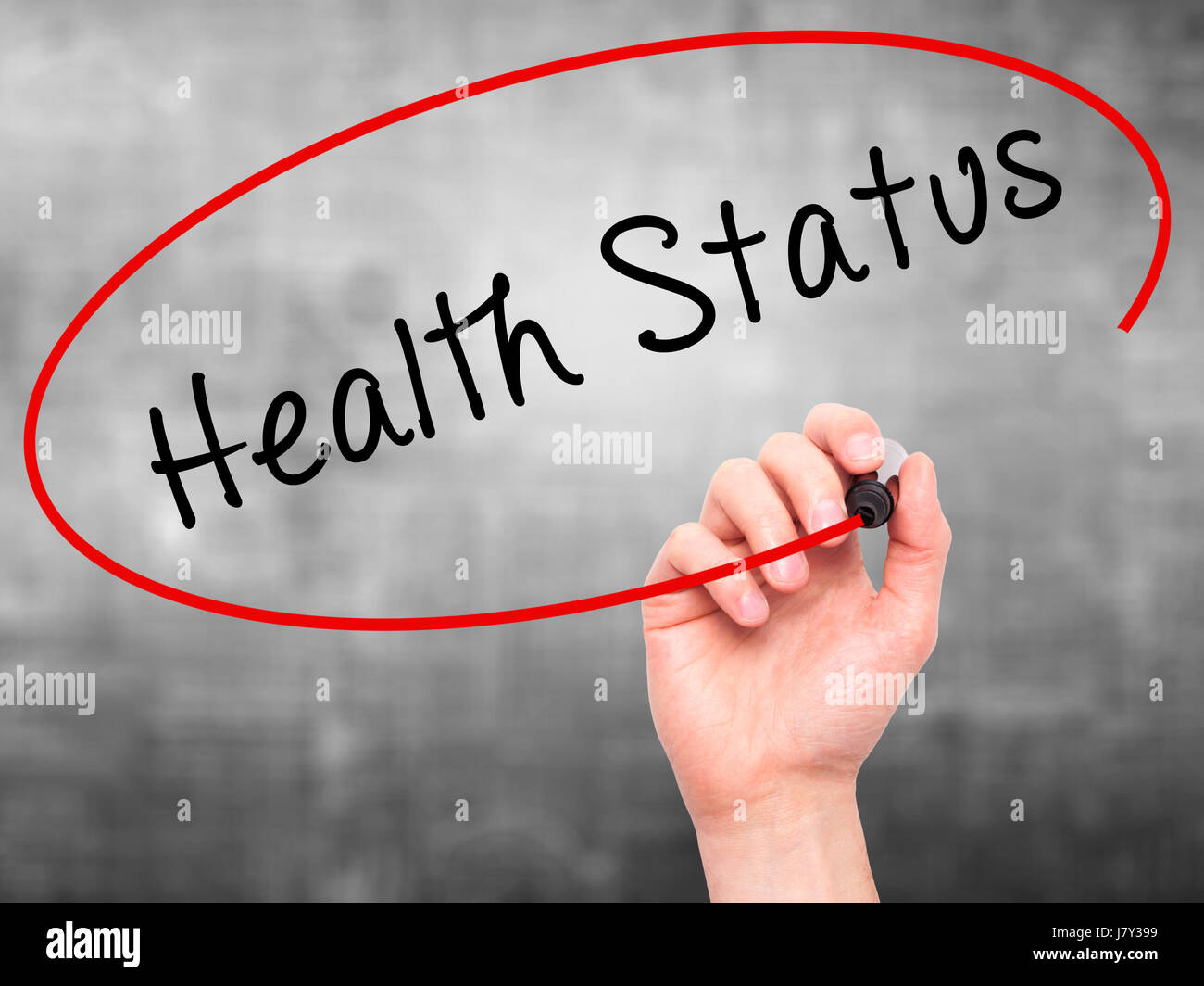 Man hand writing Health Status on visual screen. Business,help ...