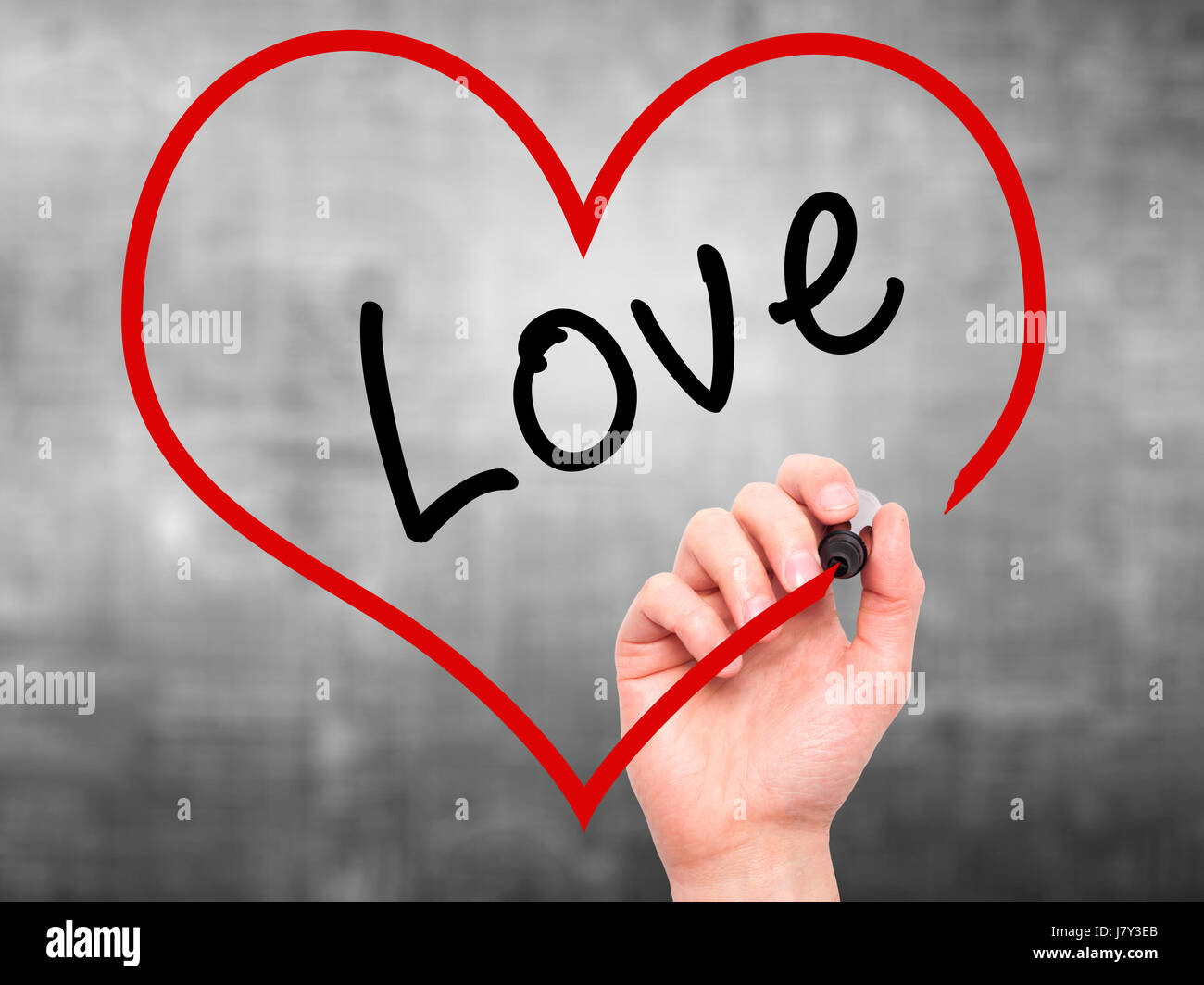 Man Hand writing Love with marker on transparent wipe board. Isolated ...