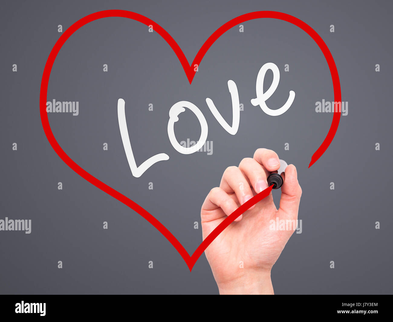 Man Hand writing Love with marker on transparent wipe board. Isolated ...