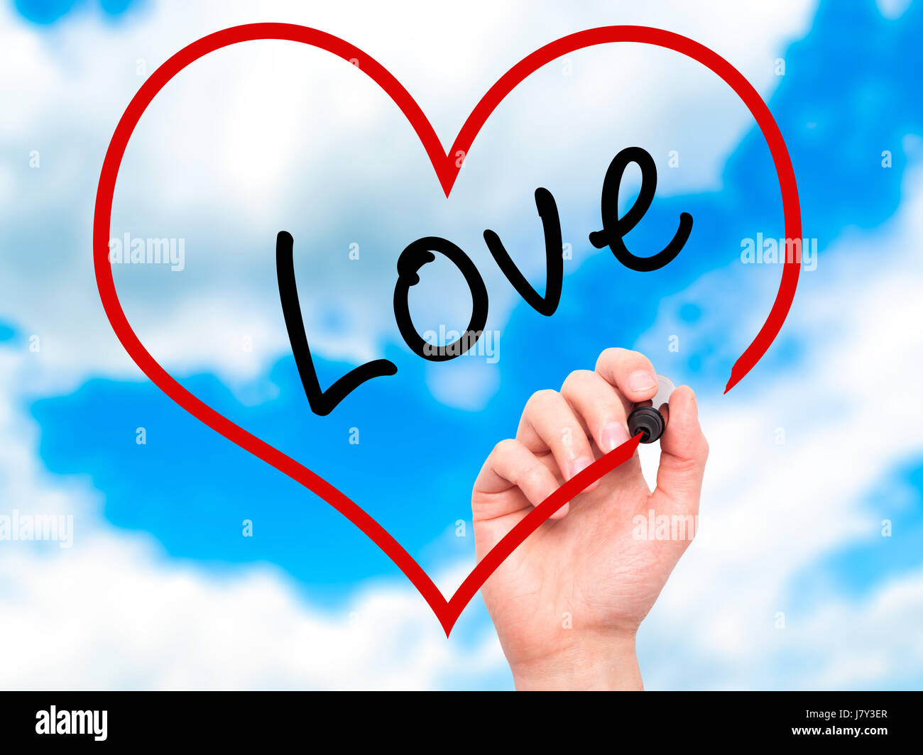 Man Hand writing Love with marker on transparent wipe board. Isolated ...