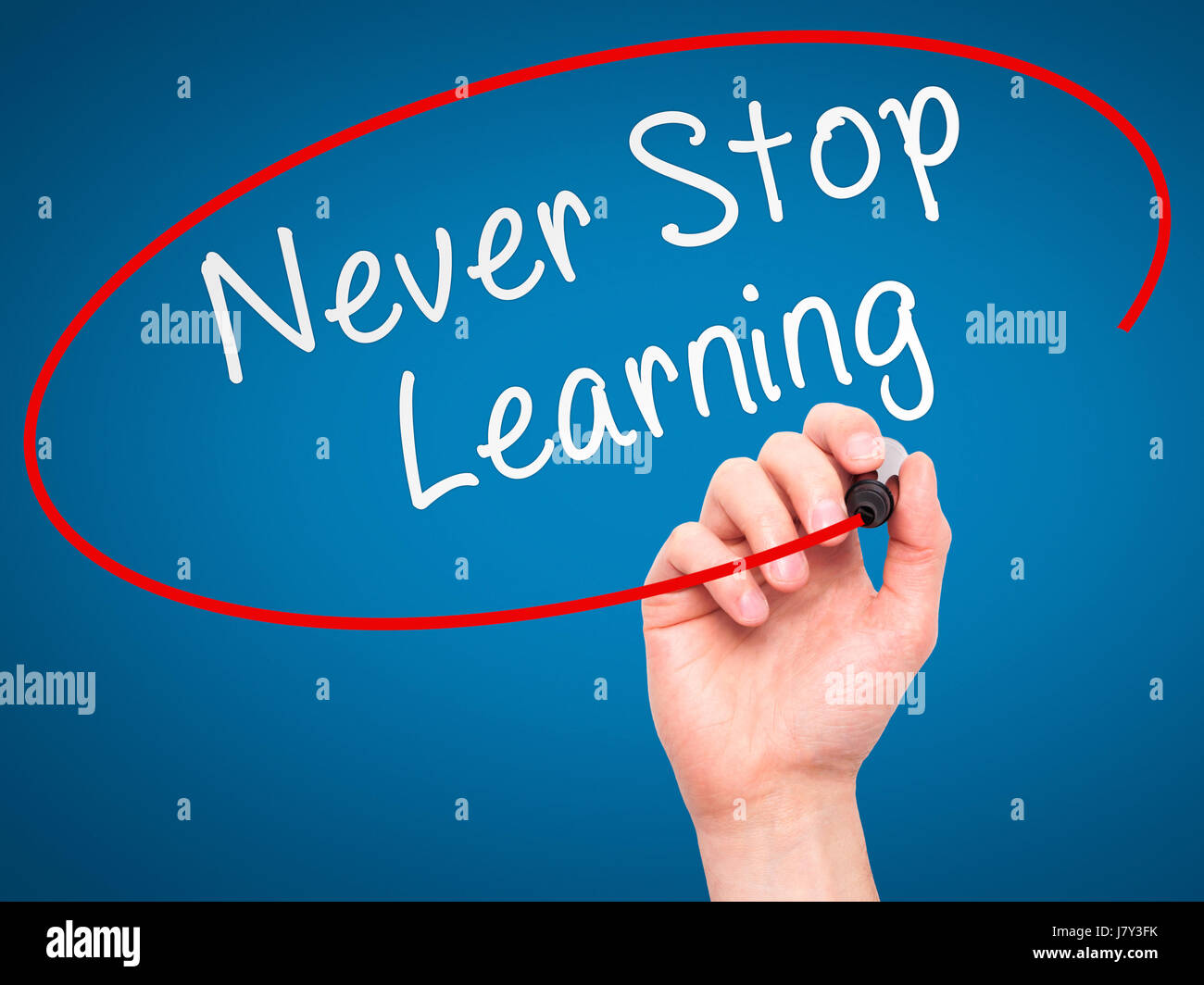 Man hand writing Never Stop Learning on visual screen. Business,help ...