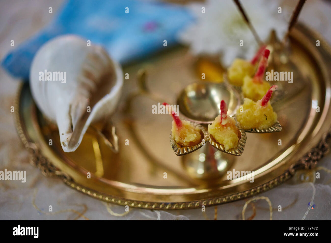 Puja parafernalia for worship Krishna Stock Photo - Alamy