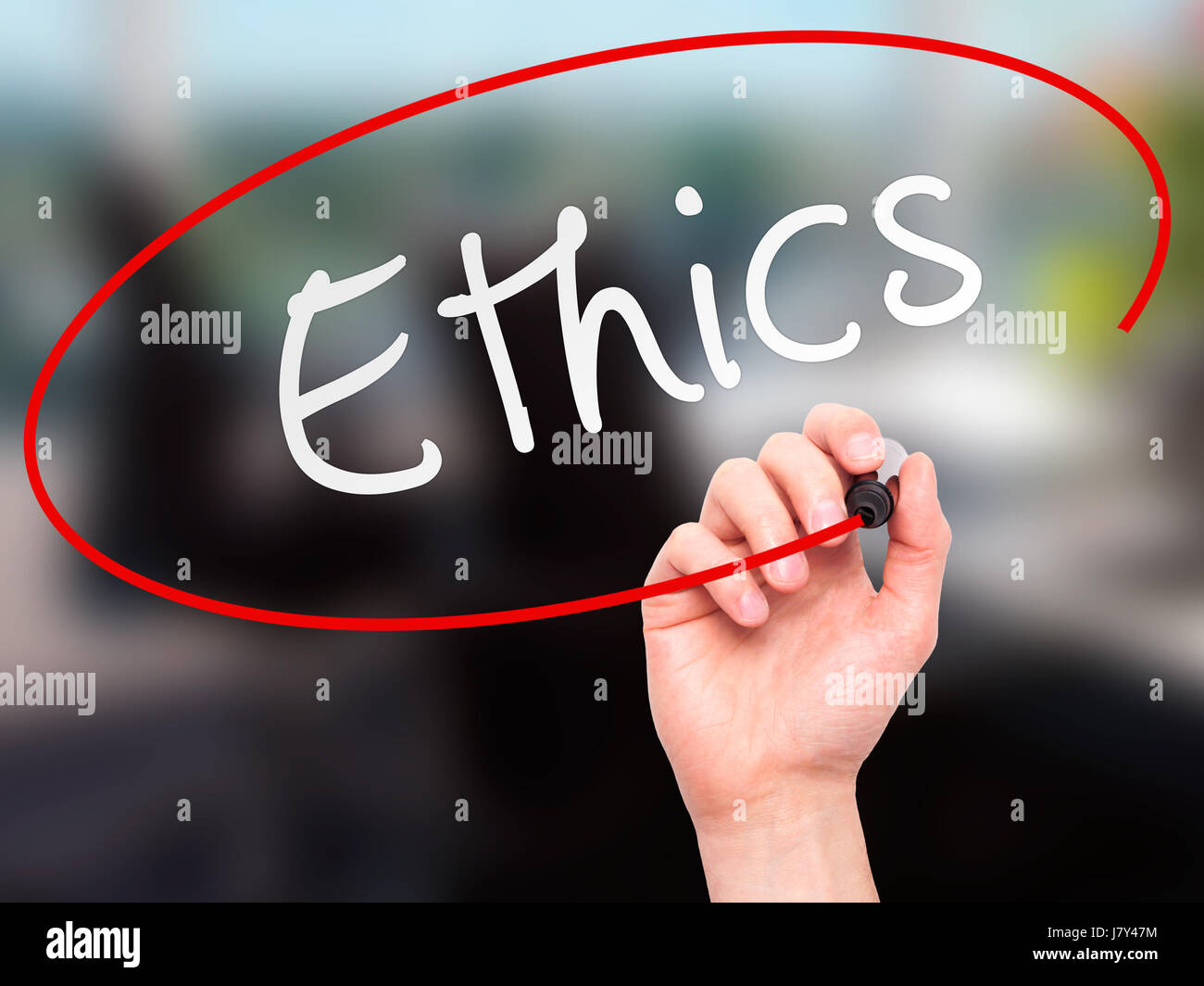 Man hand writing Ethics on visual screen. Business,help, internet ...