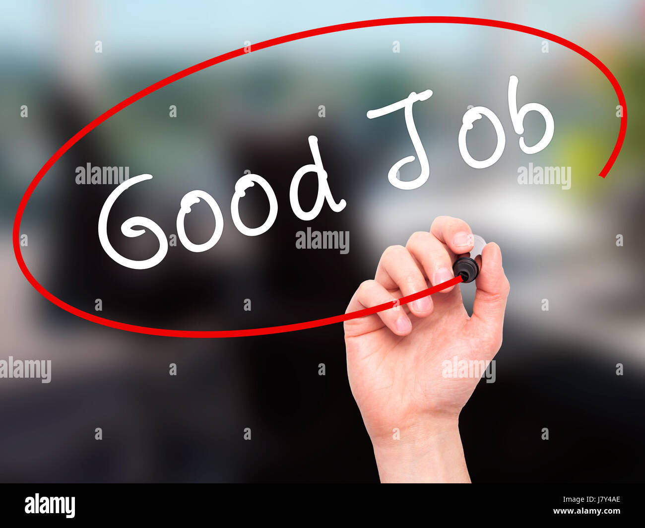 Man Hand writing Good Job with marker on transparent wipe board ...