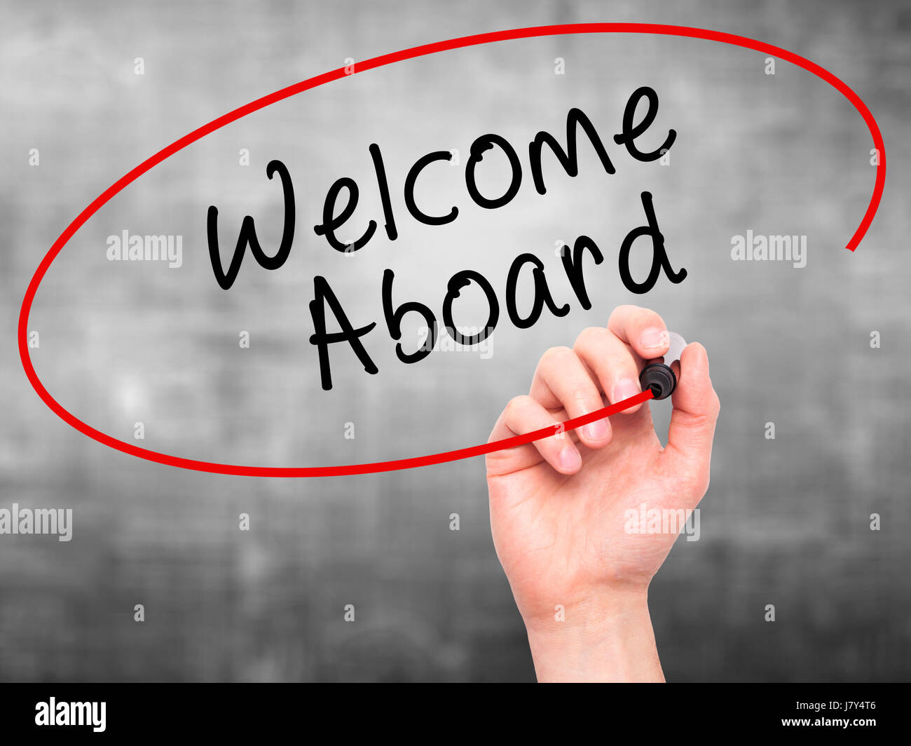 Man hand writing Welcome Aboard on visual screen. Business,help ...