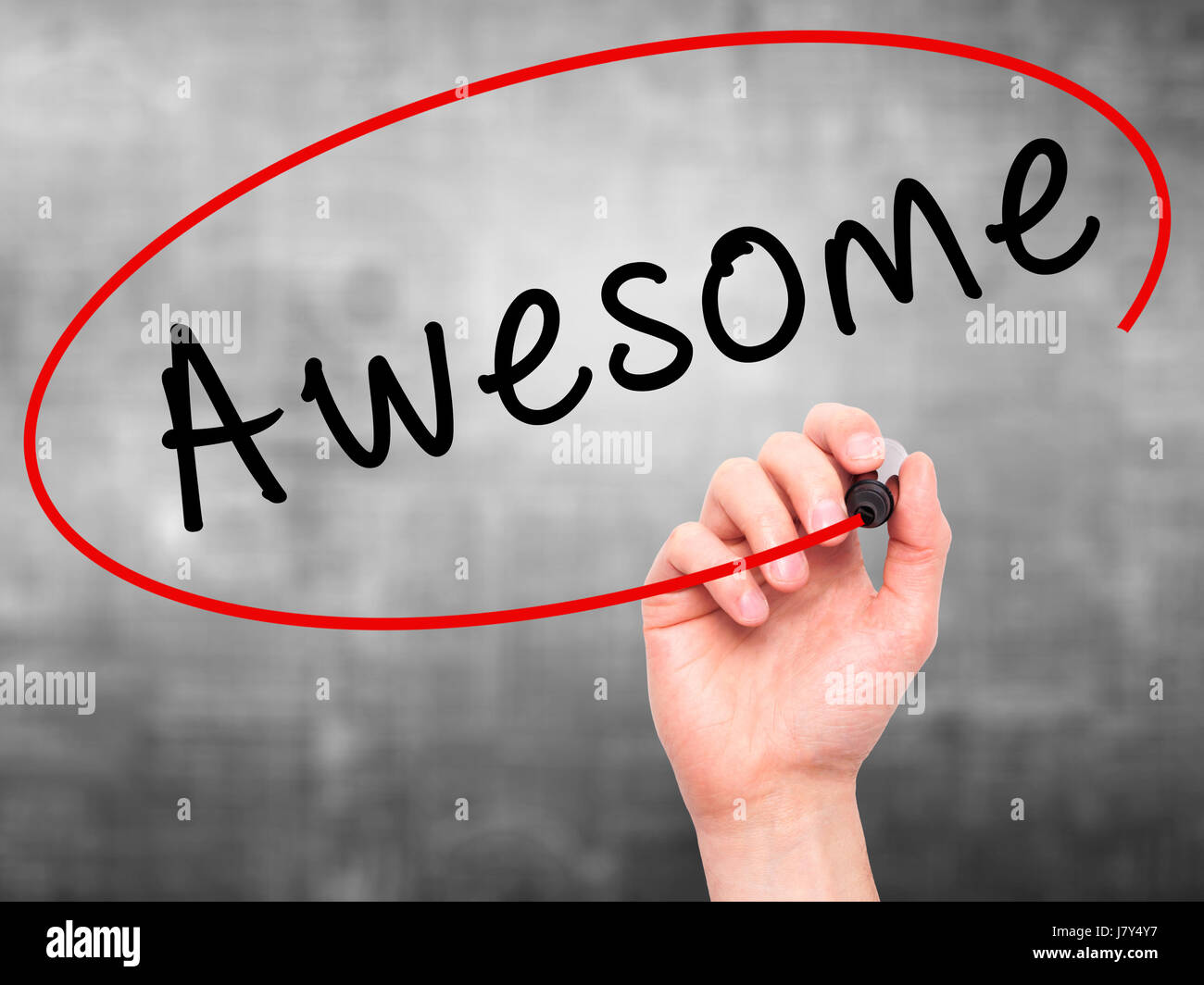 Man Hand writing Awesome with black marker on visual screen. Isolated ...