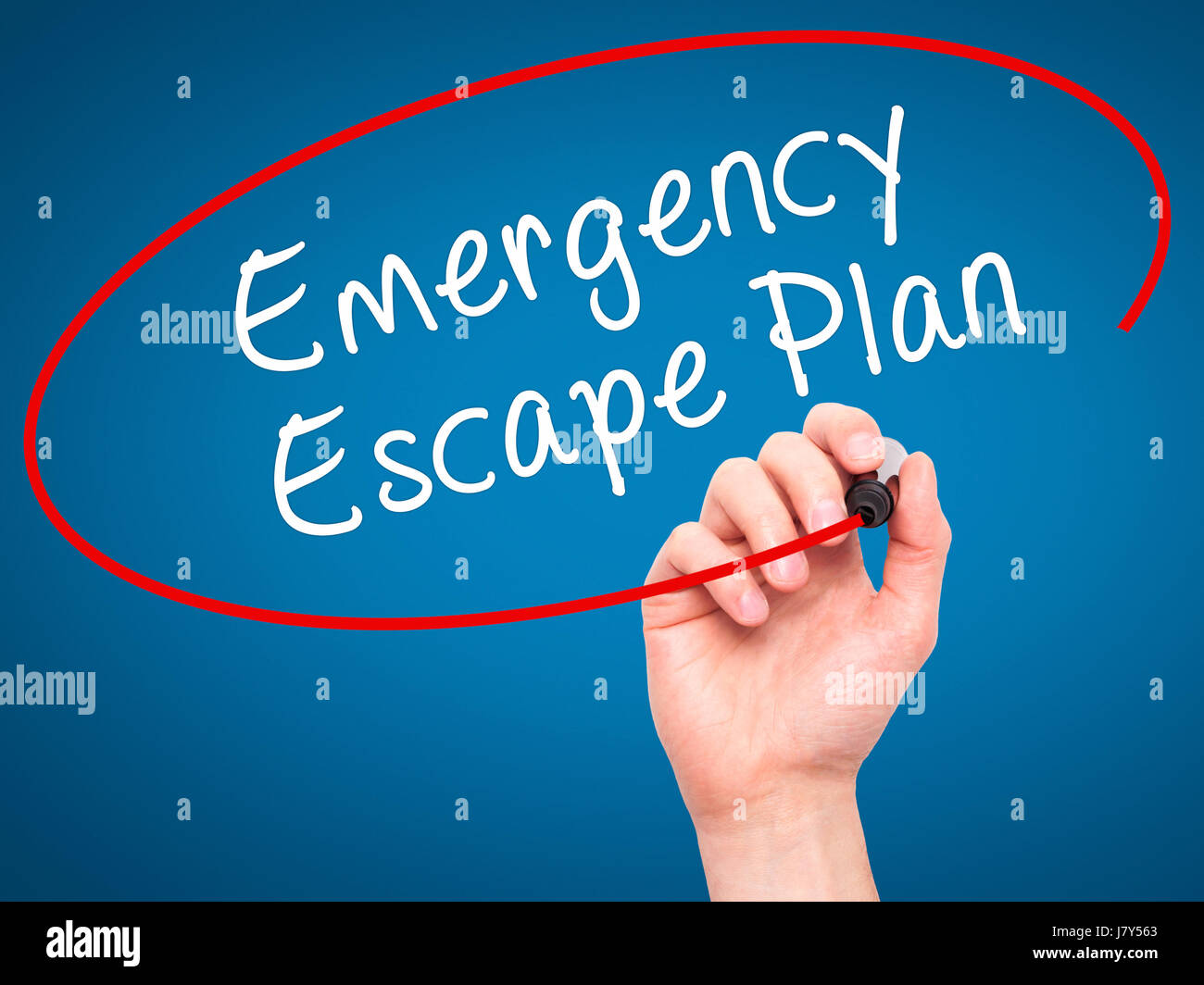 Man Hand writing Emergency Escape Plan with black marker on visual ...