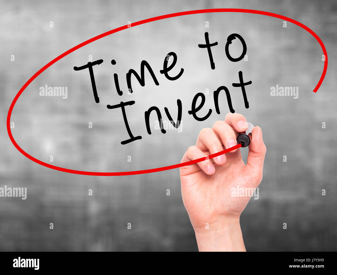 Man Hand writing Time to Invent with black marker on visual screen ...