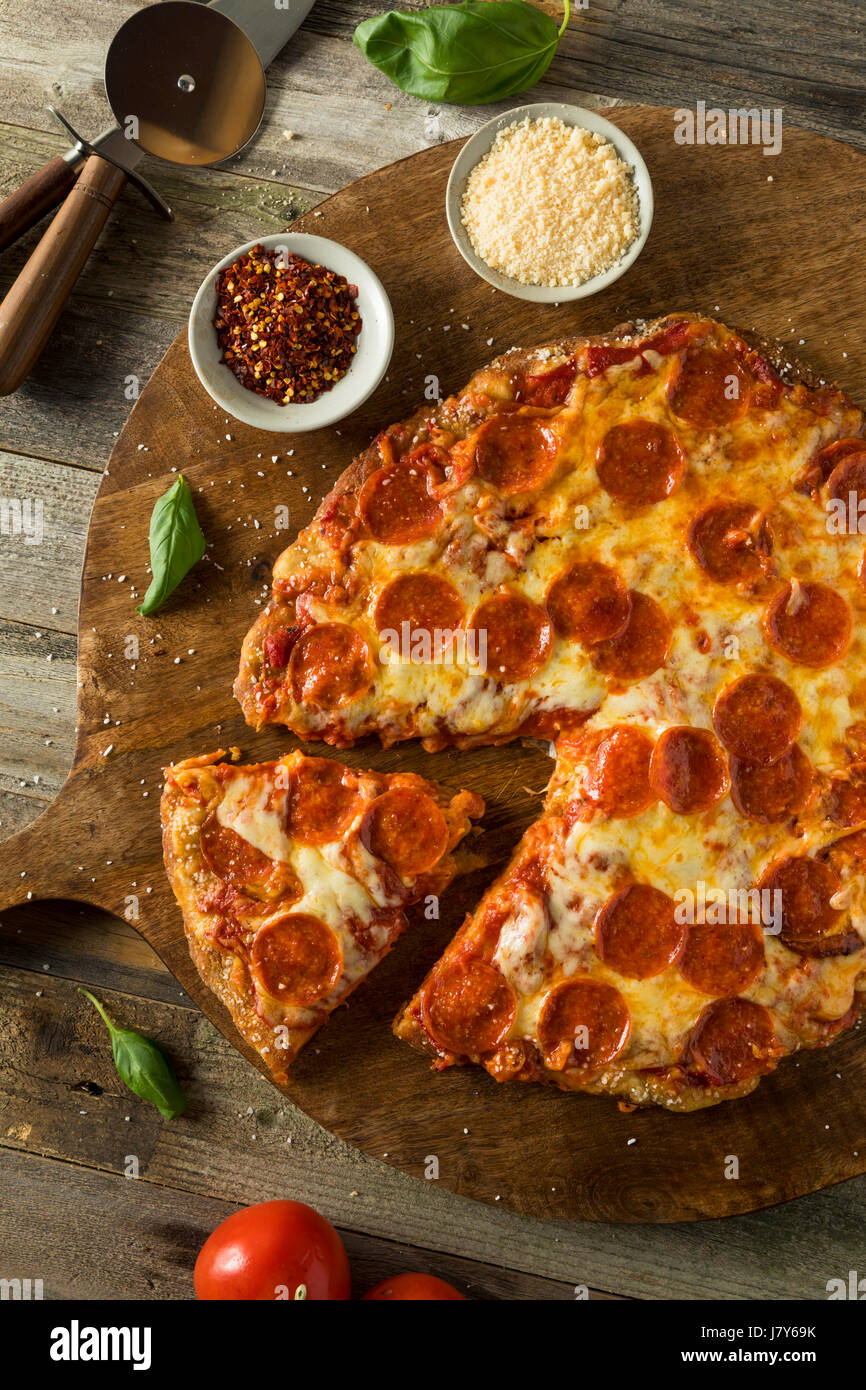 Homemade Pepperoni Pretzel Crust PIzza with Salt and Cheese Stock Photo ...