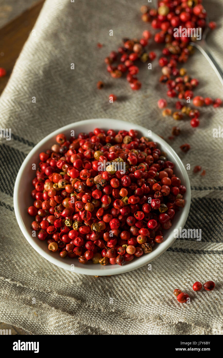 Dry Organic Red Peppercorns Ready to Grind Up Stock Photo - Alamy
