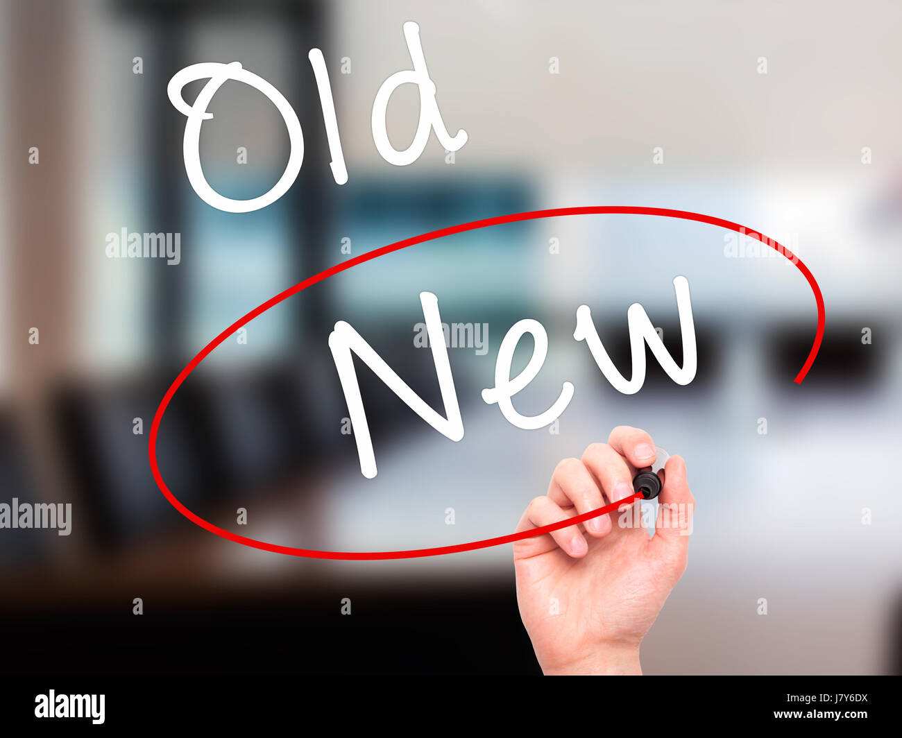 Man Hand writing and choosing New instead of Old with black marker on ...