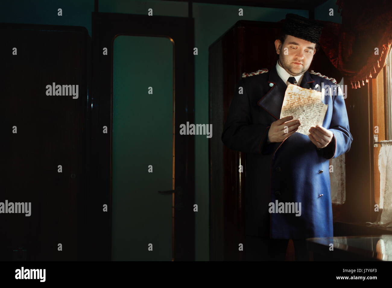 Man reading manuscript hi-res stock photography and images - Alamy