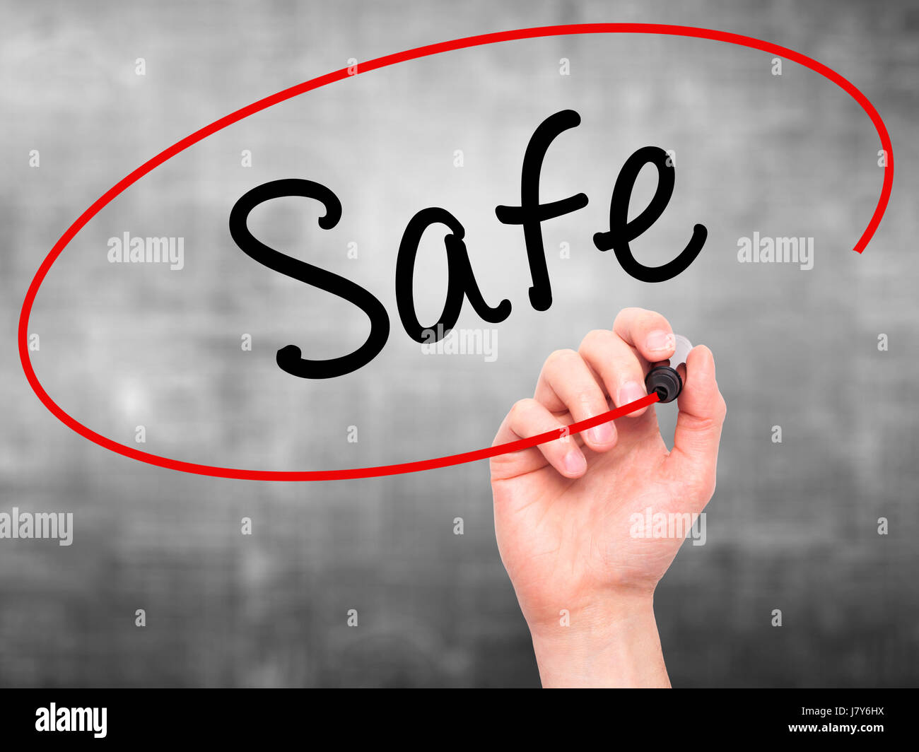 Man Hand writing Safe with black marker on visual screen. Isolated on ...