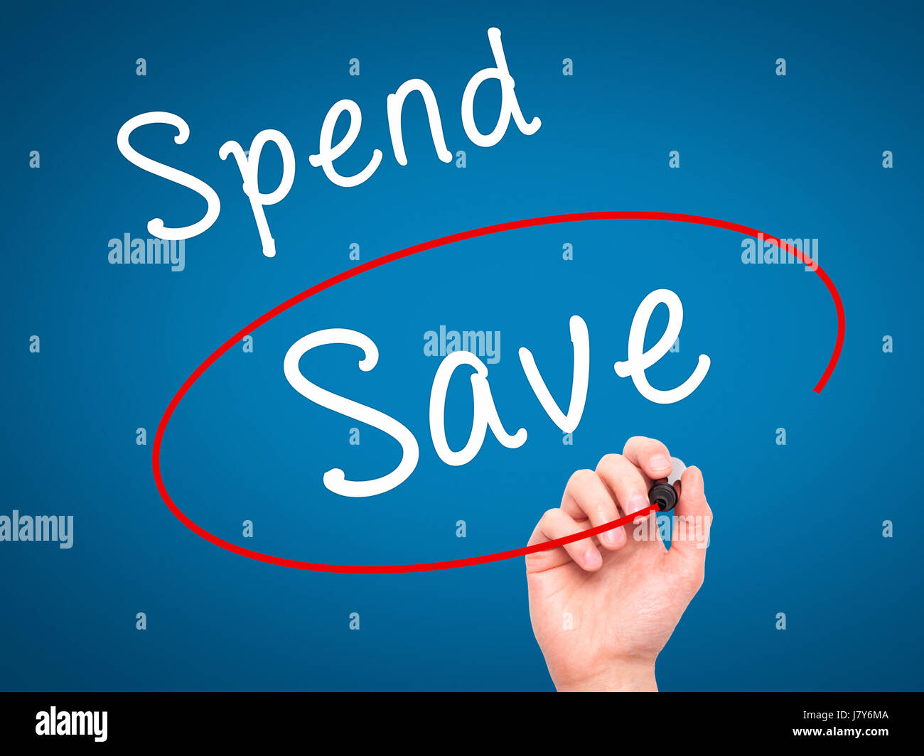 Man Hand writing and choosing Save instead of Spend with black marker ...