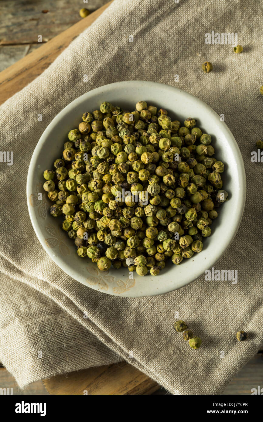 Raw Green Organic Peppercorns Ready to Cook With Stock Photo - Alamy